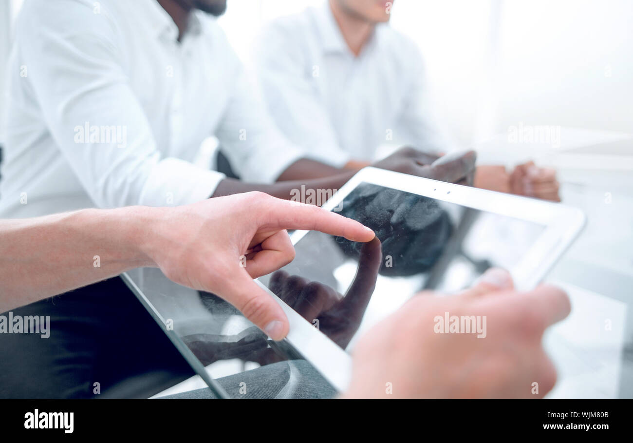 employee using a digital tablet at the workplace Stock Photo - Alamy