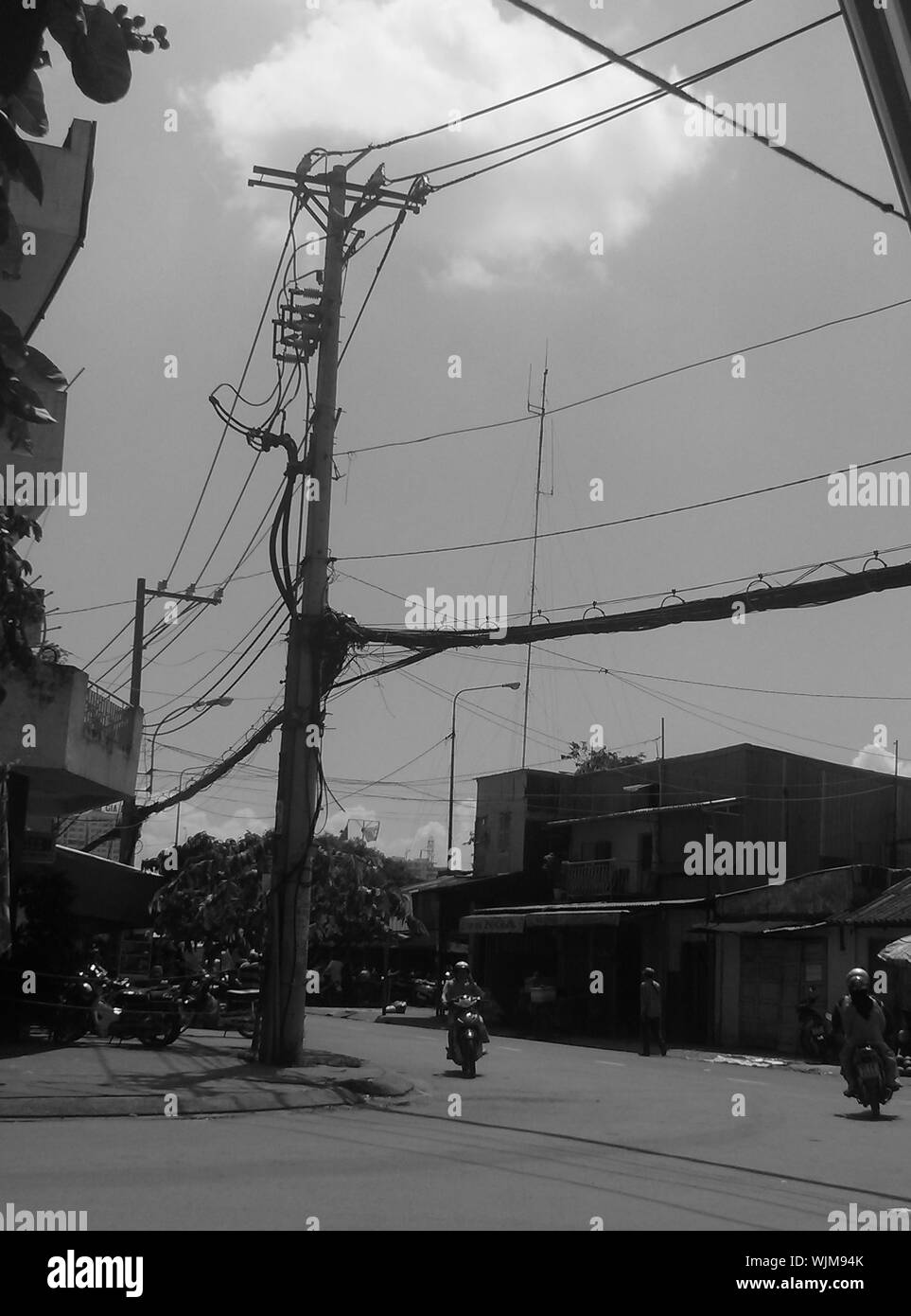 Power lines on the street hi-res stock photography and images - Alamy