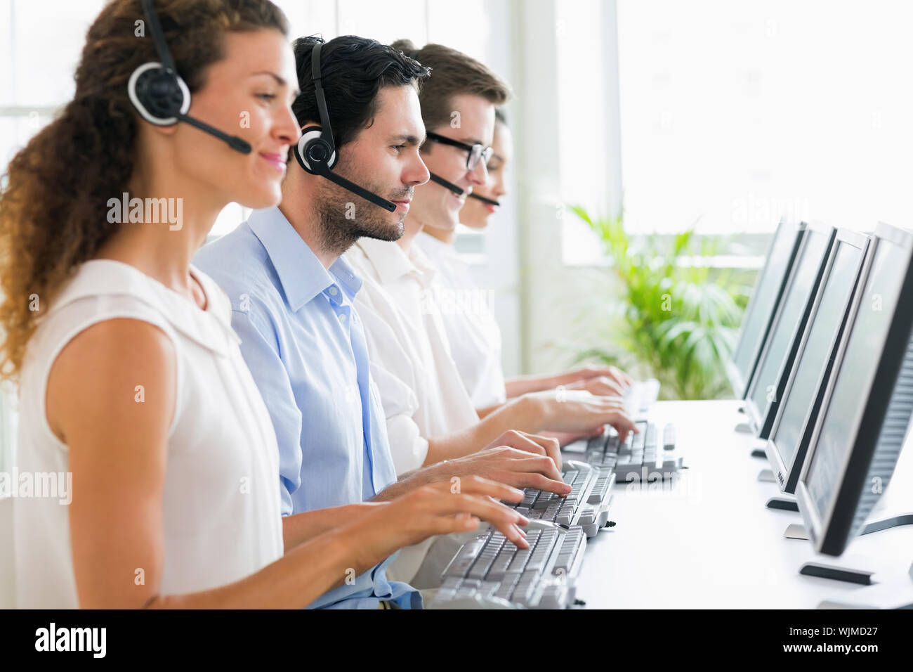 Professional call center operators hi-res stock photography and images ...