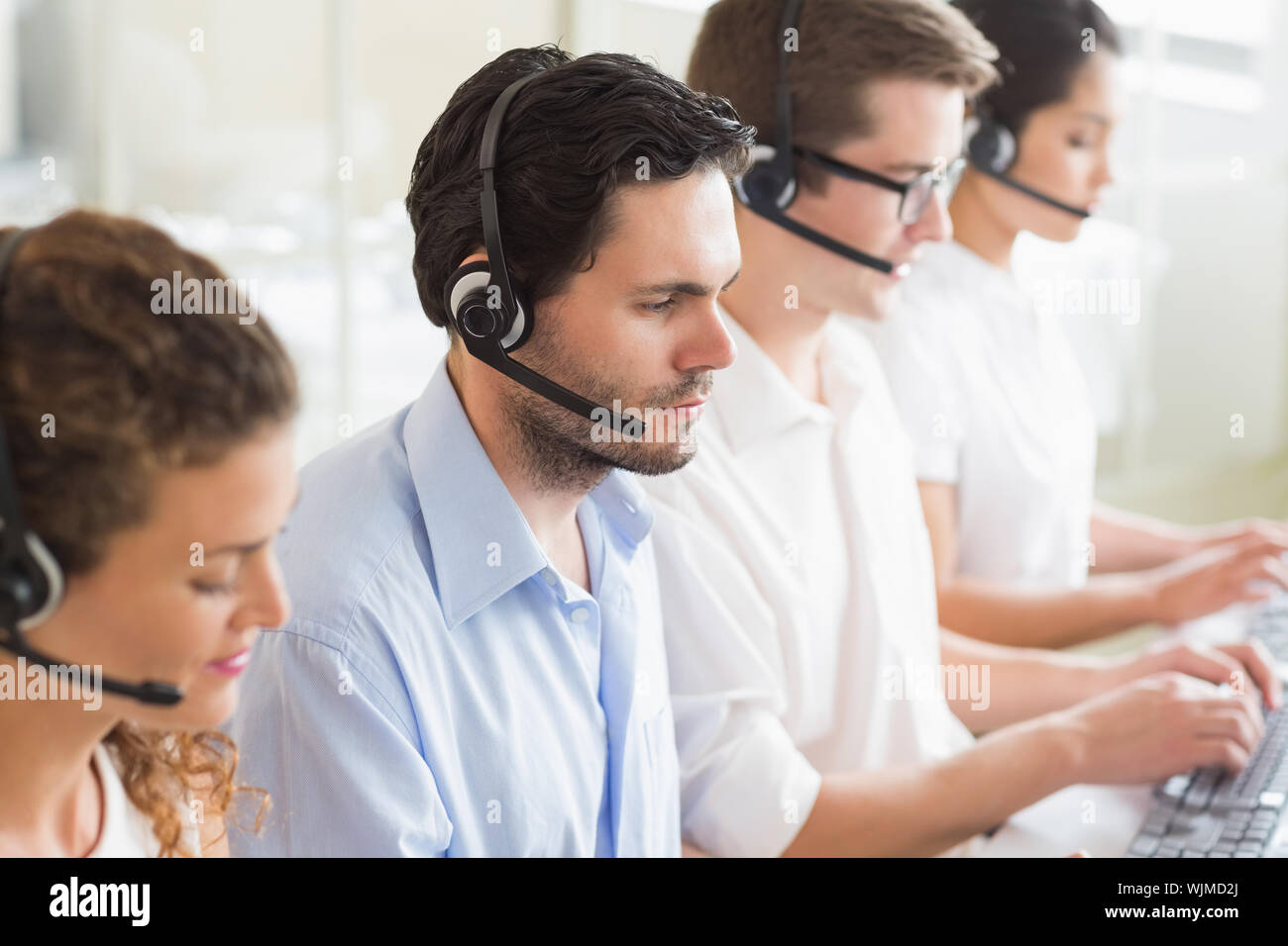 Call center agents working office hi-res stock photography and images - Alamy
