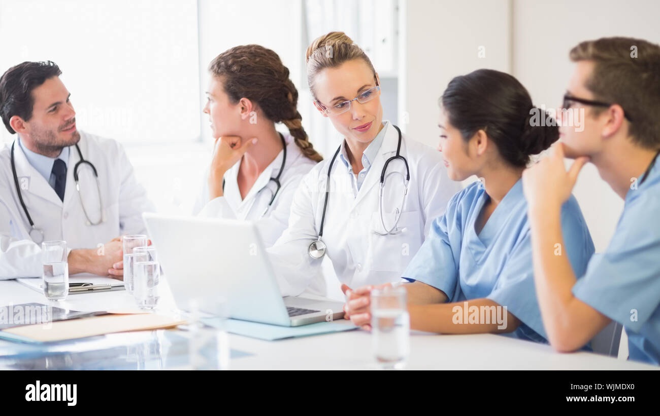 Medical team discussing in hospital Stock Photo - Alamy