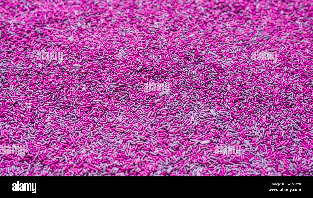 Background of colorful purple sprinkles. Food texture and pattern Stock ...