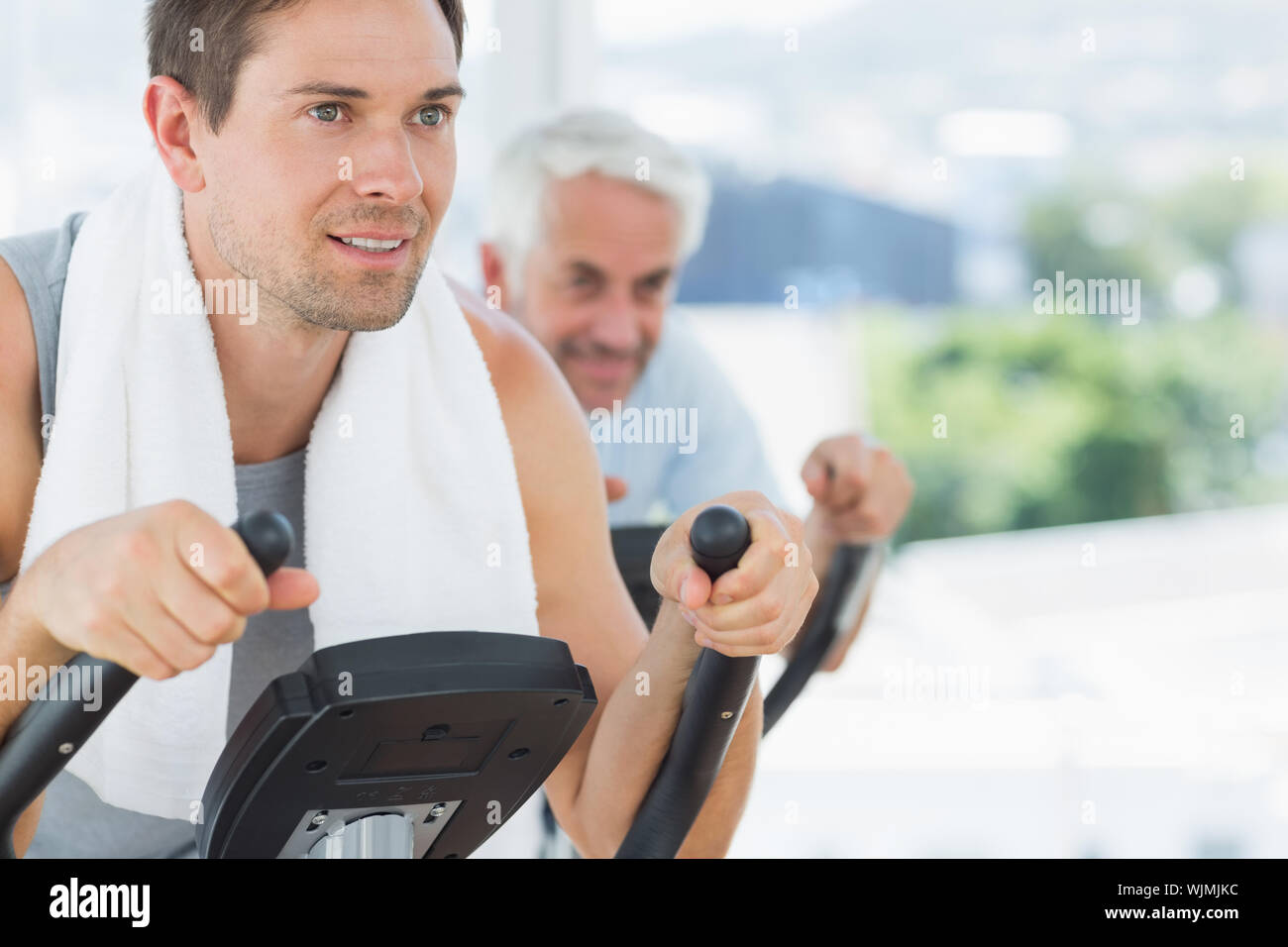 Man using exercise machine hi-res stock photography and images - Alamy
