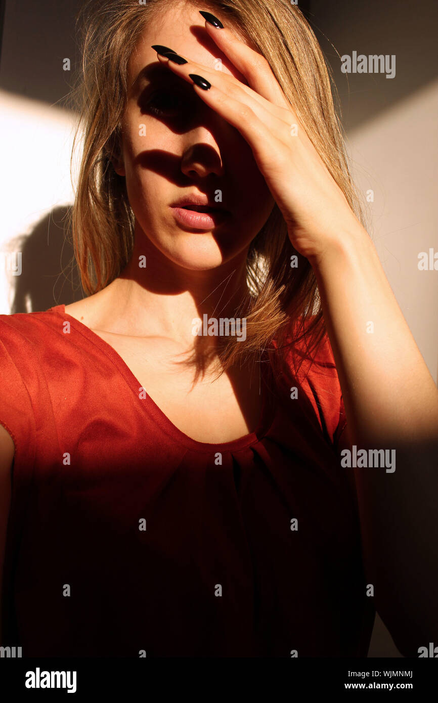 Beautiful woman covering face hi-res stock photography and images - Alamy