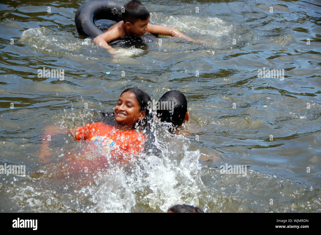 Children Playing In Pond High Resolution Stock Photography and Images ...