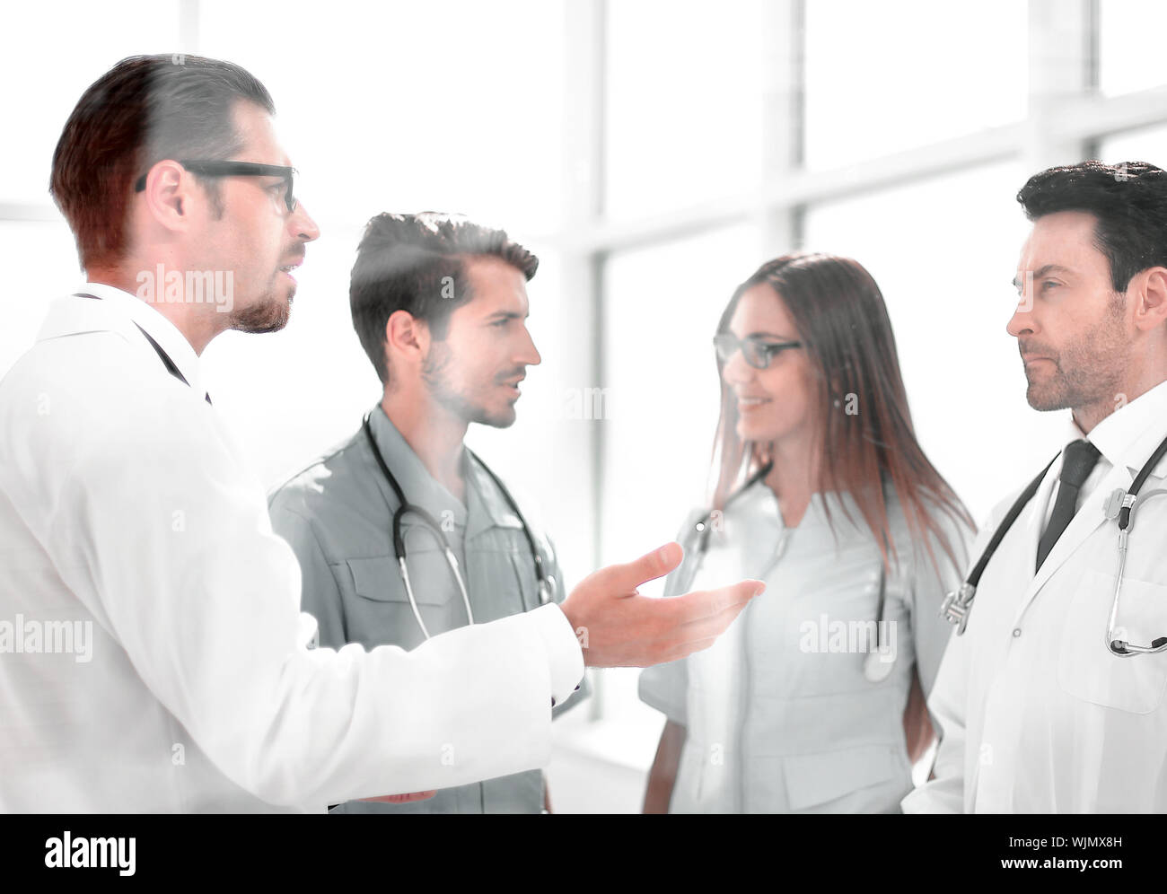 Medical team discussing in clinic Stock Photo - Alamy