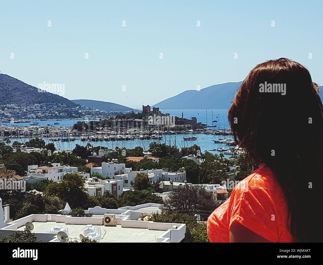Woman overlooking town architecture hi-res stock photography and images ...