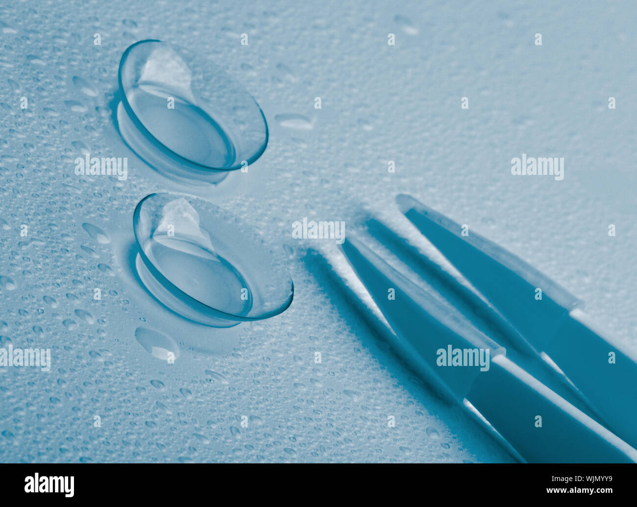 Arrangement of Two Contact Lenses with Water Droplets and Special ...