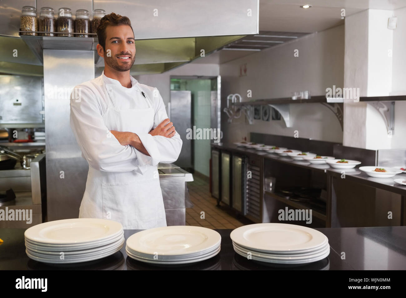 Chef behind restaurant counter hi-res stock photography and images - Alamy