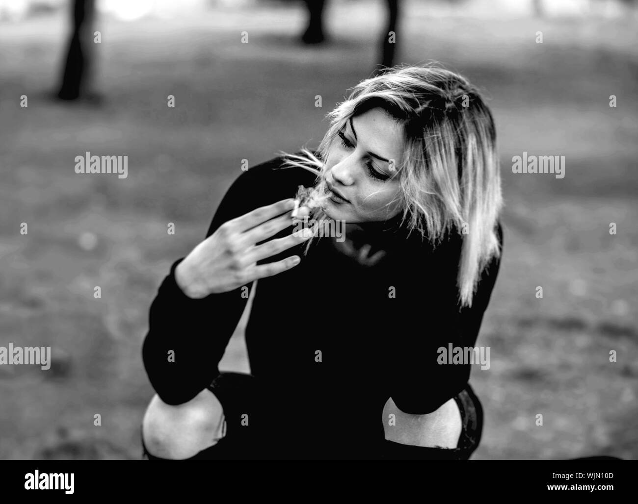 Crouching Woman Black and White Stock Photos & Images - Alamy