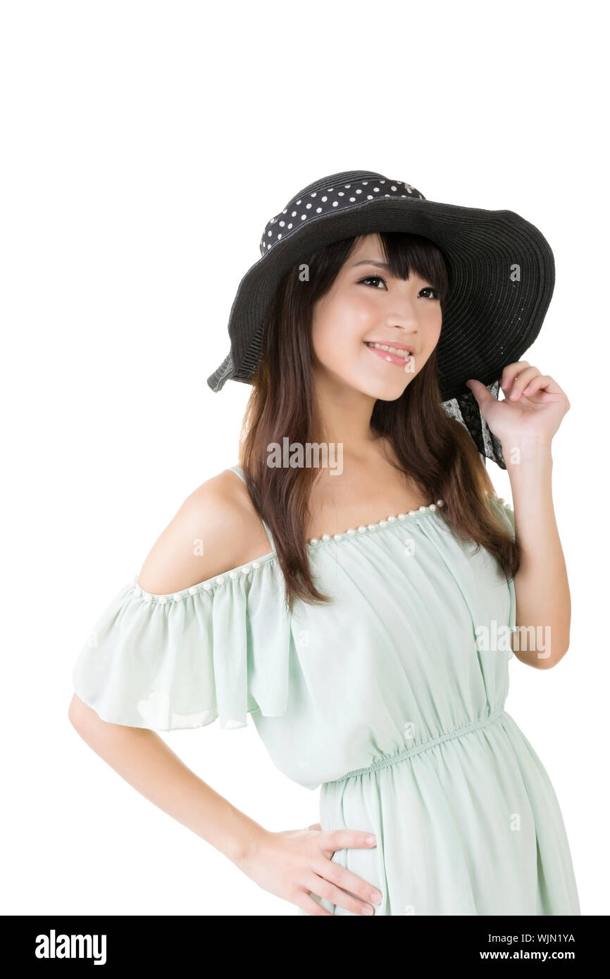 Elegant Asian woman with hat, closeup portrait on white background ...
