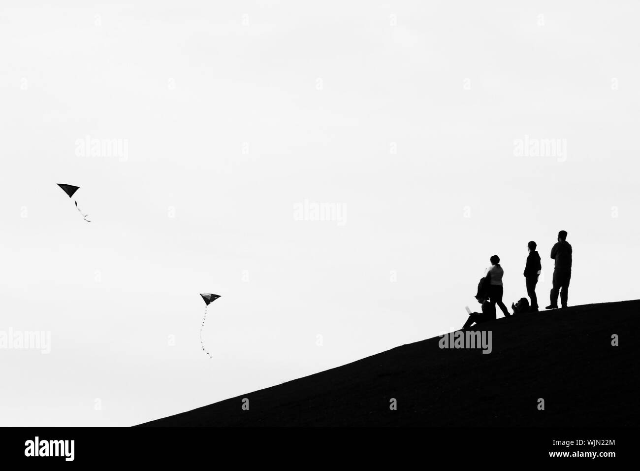 Flying kite friends hi-res stock photography and images - Alamy