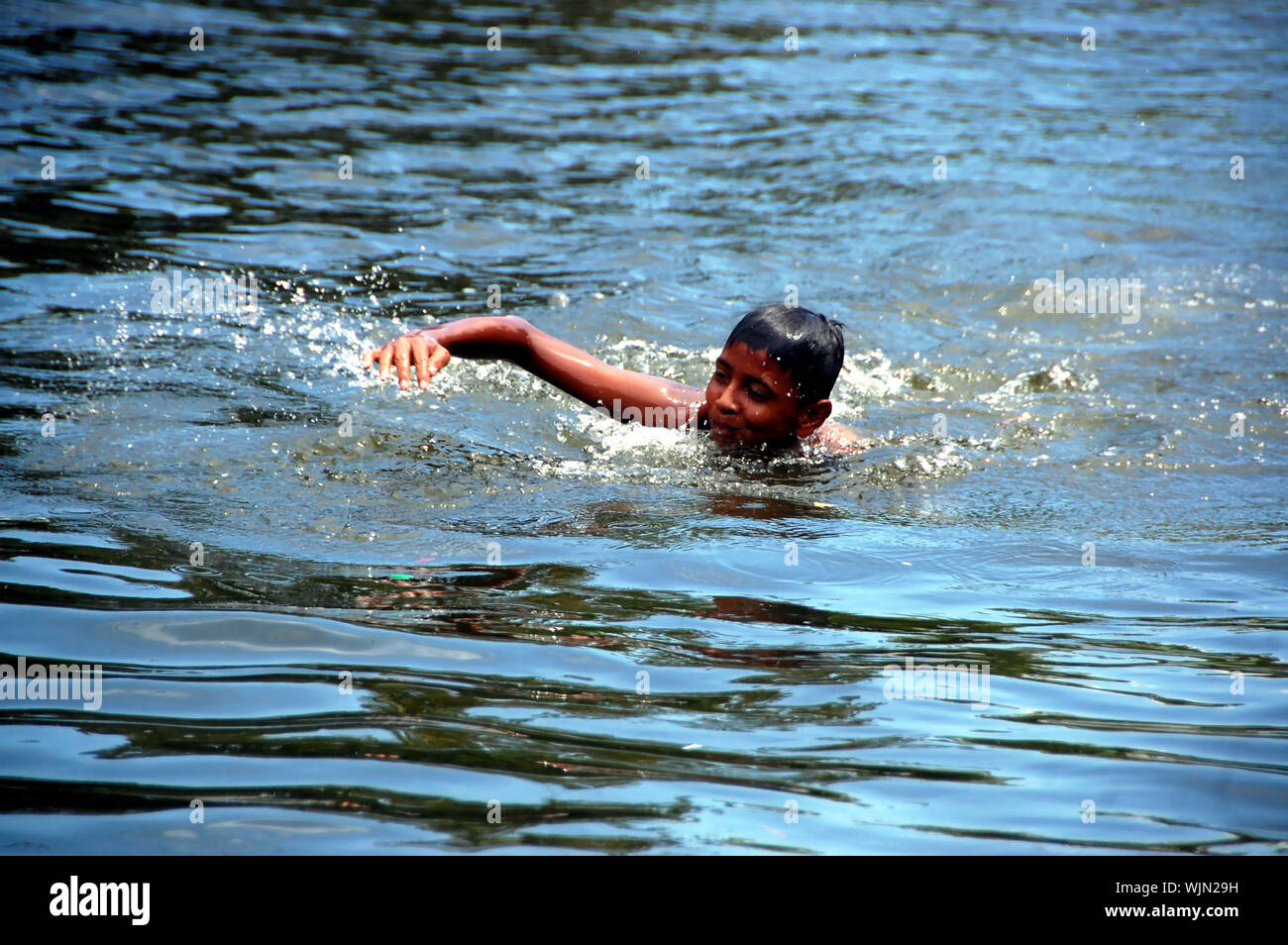Children Playing In Pond High Resolution Stock Photography and Images ...