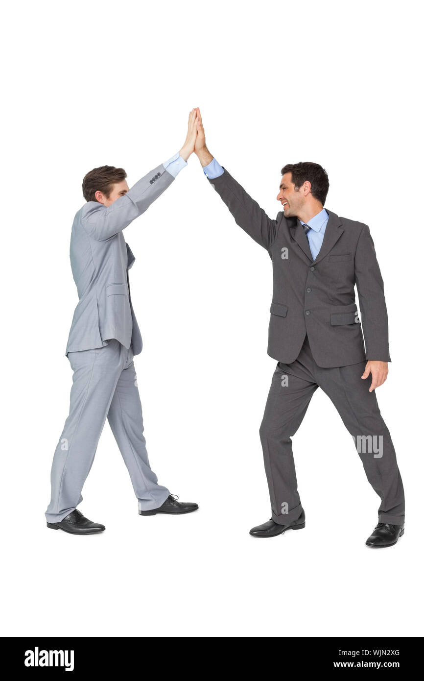High fiving each other isolated hi-res stock photography and images - Alamy