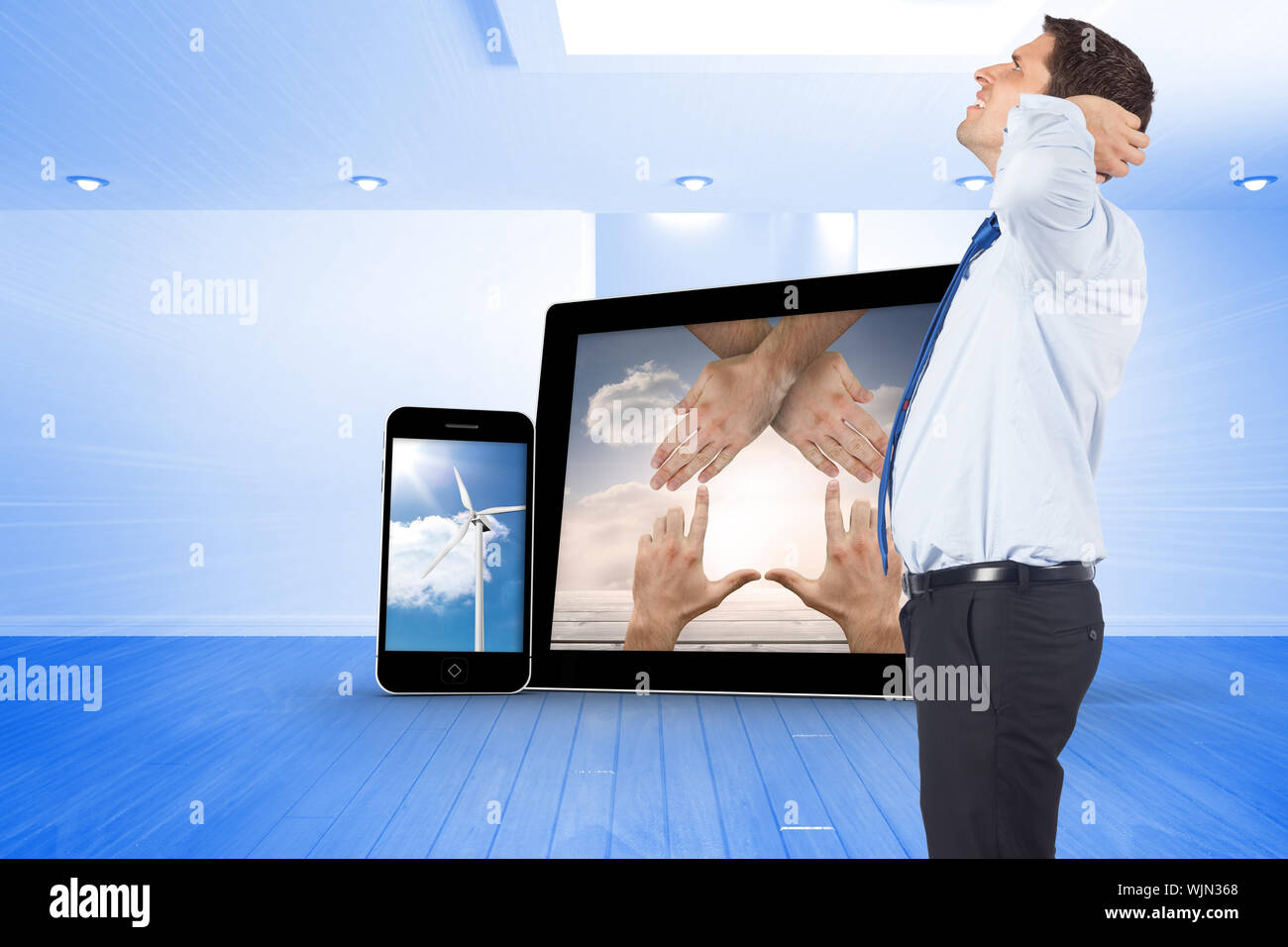 Thinking businessman scratching head against bright blue room with ...