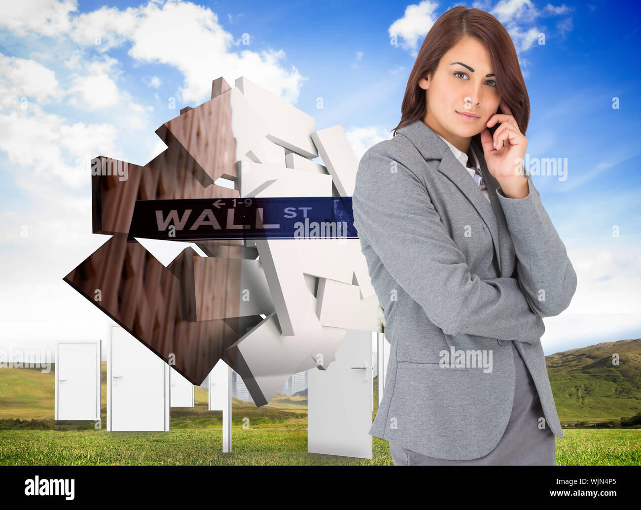 Smiling thoughtful businesswoman against open doors in a meadow Stock ...