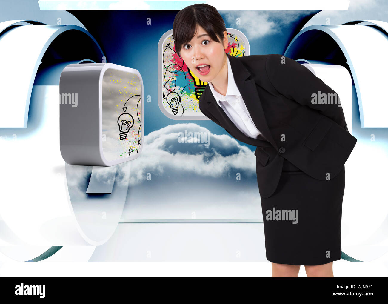 Surprised businesswoman bending against cloud in a futuristic structure ...