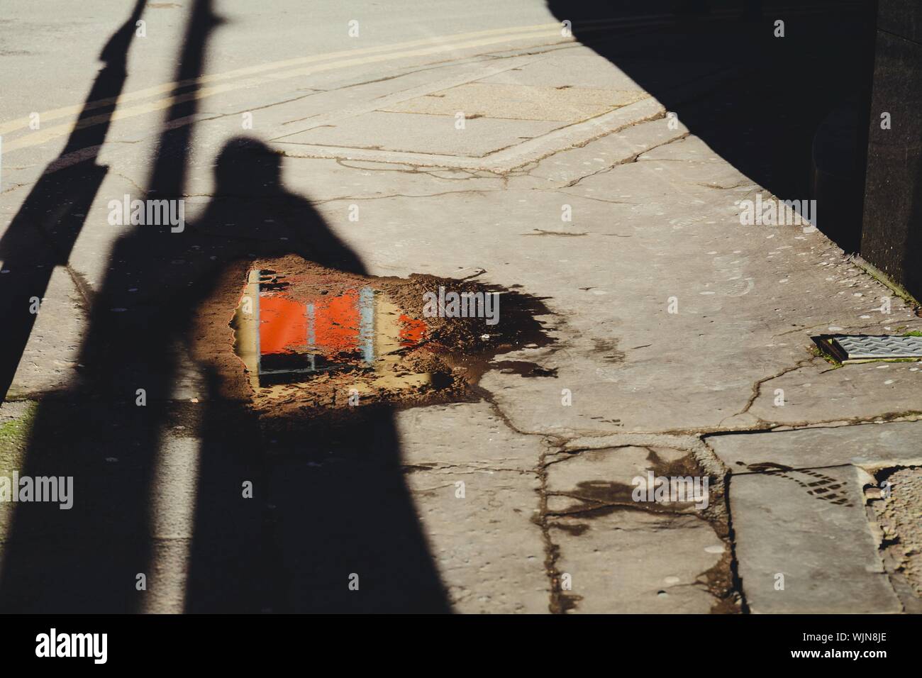 Puddle focus on shadow hi-res stock photography and images - Alamy