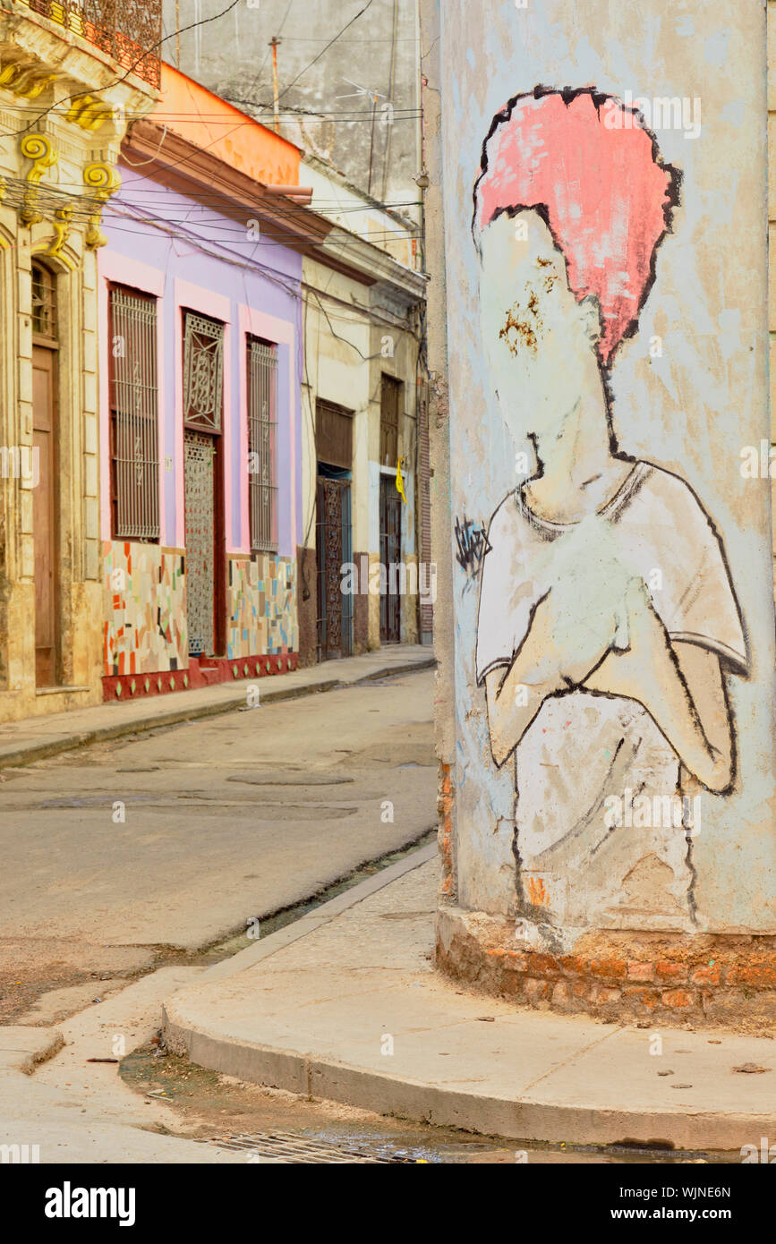 Street photography in Central Havana- Wall mural painted on colonial ...