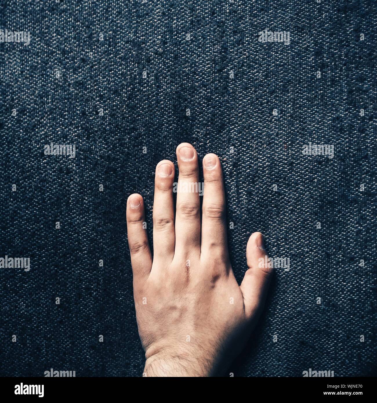 Hand Touching Fabric High Resolution Stock Photography and Images - Alamy