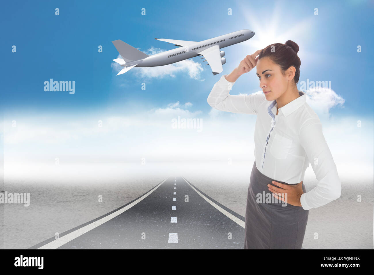 Focused businesswoman against open road Stock Photo - Alamy