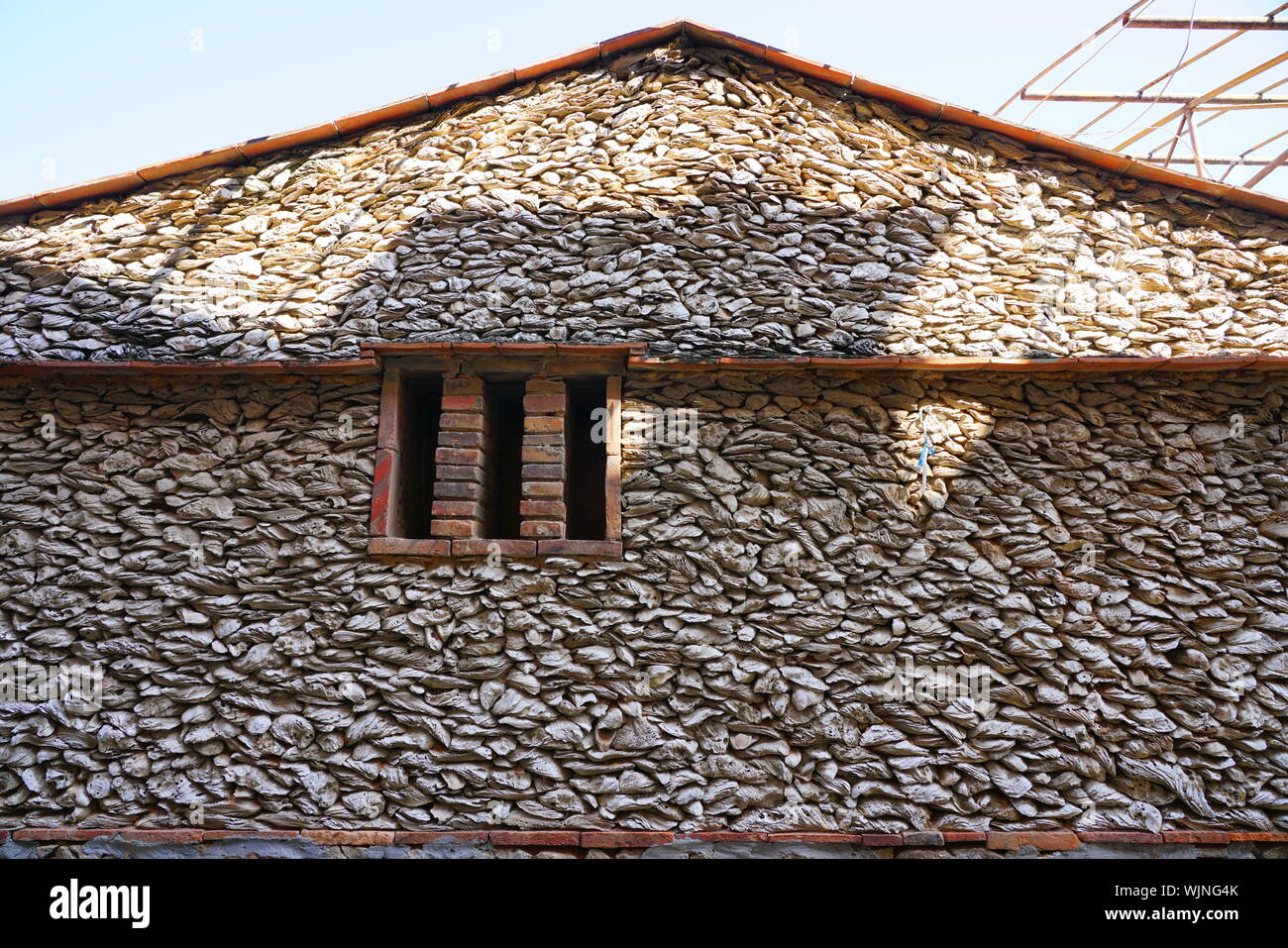 View of a traditional cultural relic house made of oyster shells ...
