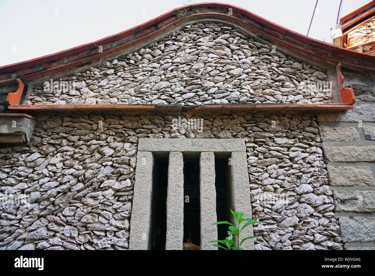 View of a traditional cultural relic house made of oyster shells ...