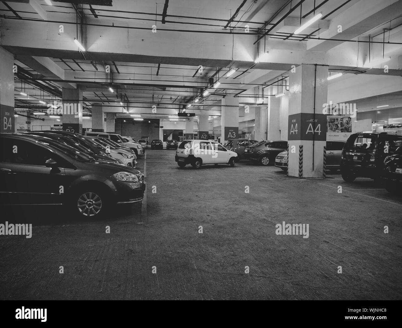 Underground parking with cars hi-res stock photography and images - Alamy