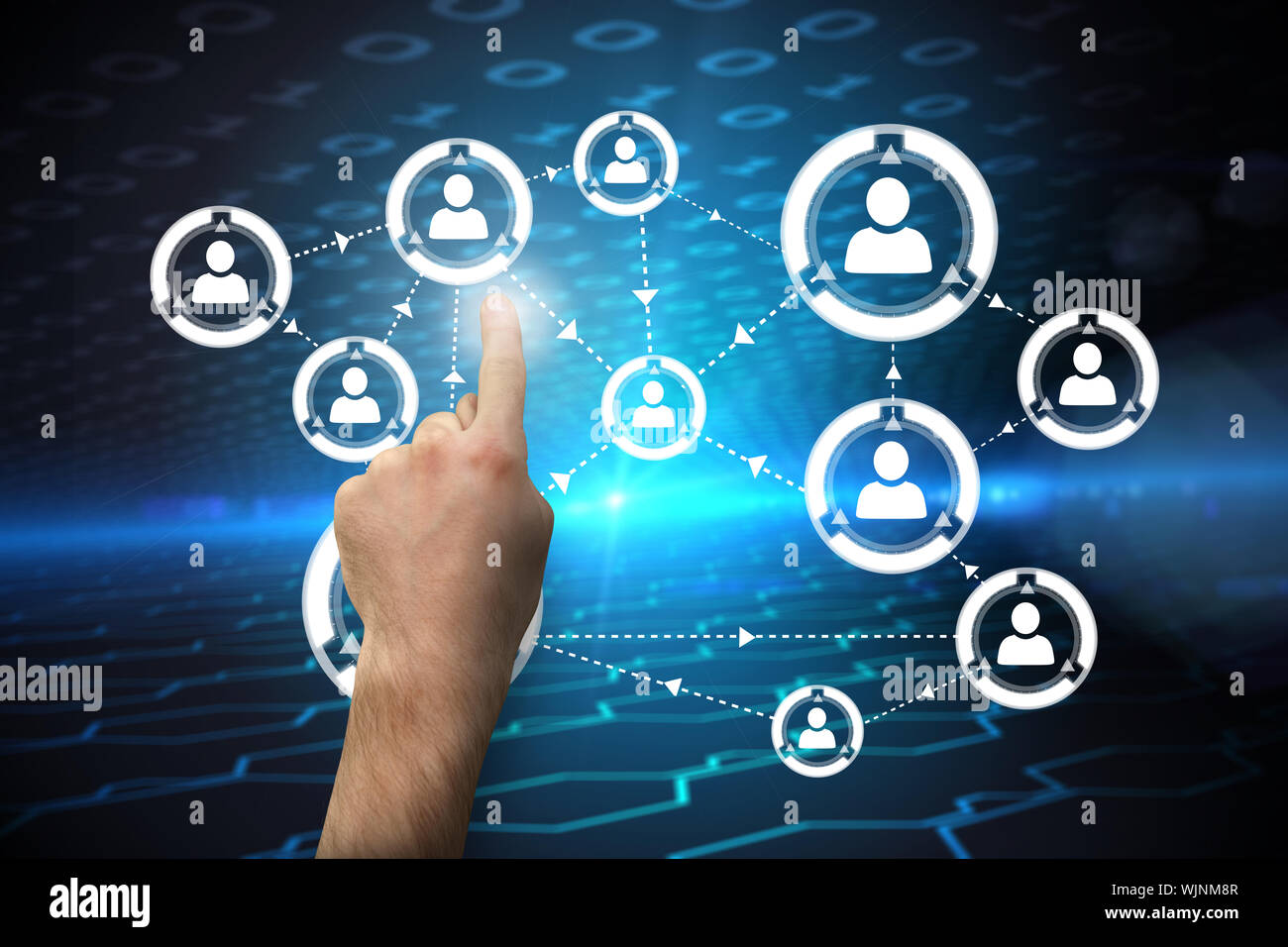 Hand pointing against hexagon pattern on technical background with binary code Stock Photo - Alamy