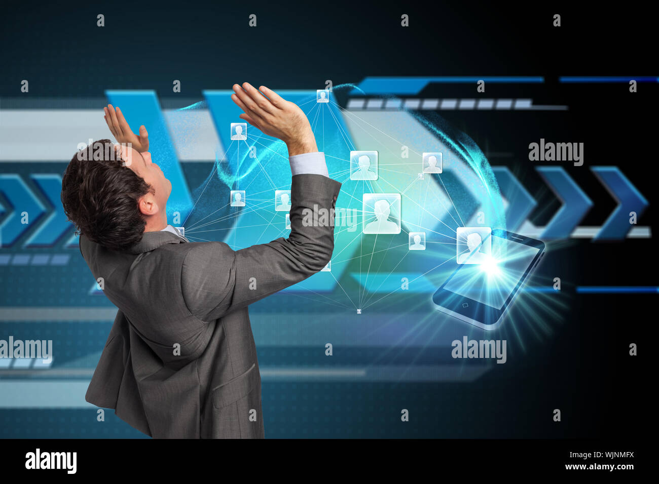 Businessman standing with arms pressing up against arrows on technical ...