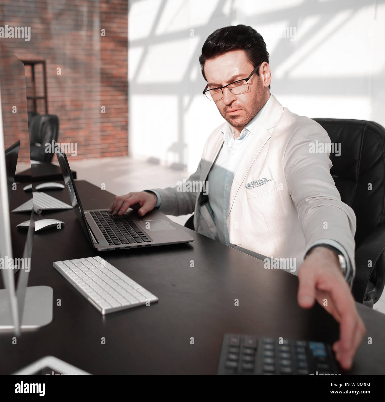Man behind office desk studying hi-res stock photography and images - Alamy
