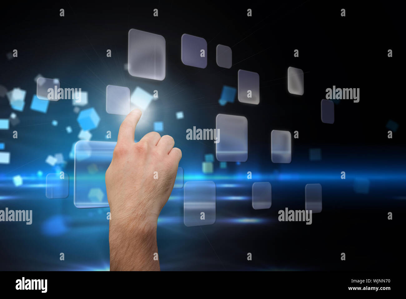 Hand pointing against boxes on technical background Stock Photo - Alamy