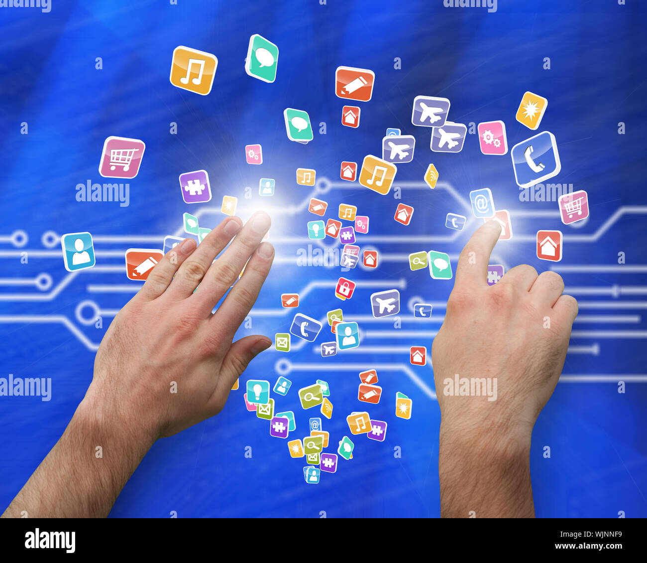 Hand pointing against white circuit board on blue background Stock ...