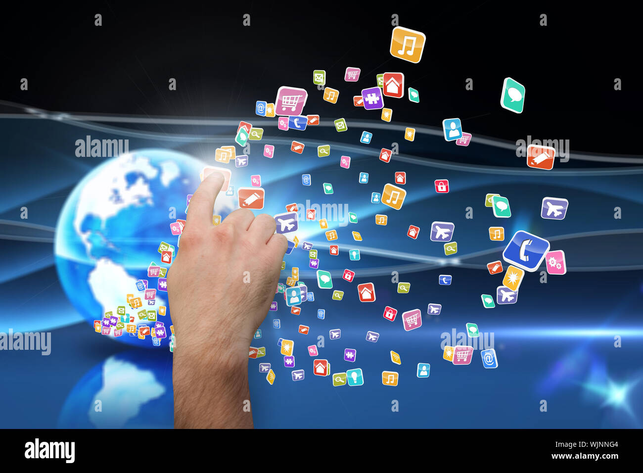 Hand pointing against digital earth background Stock Photo - Alamy