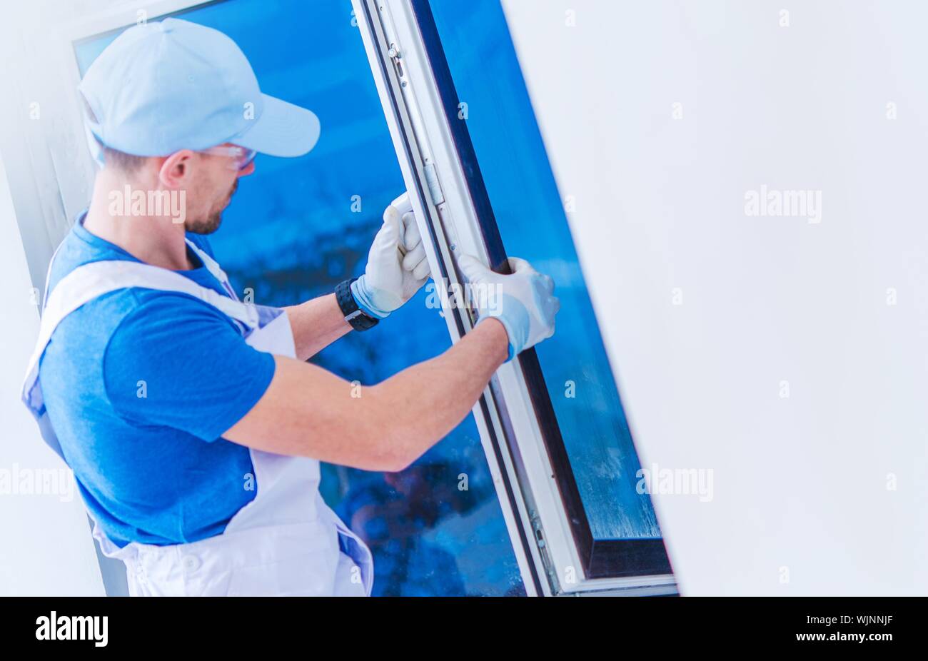 Fixing his hi-res stock photography and images - Alamy