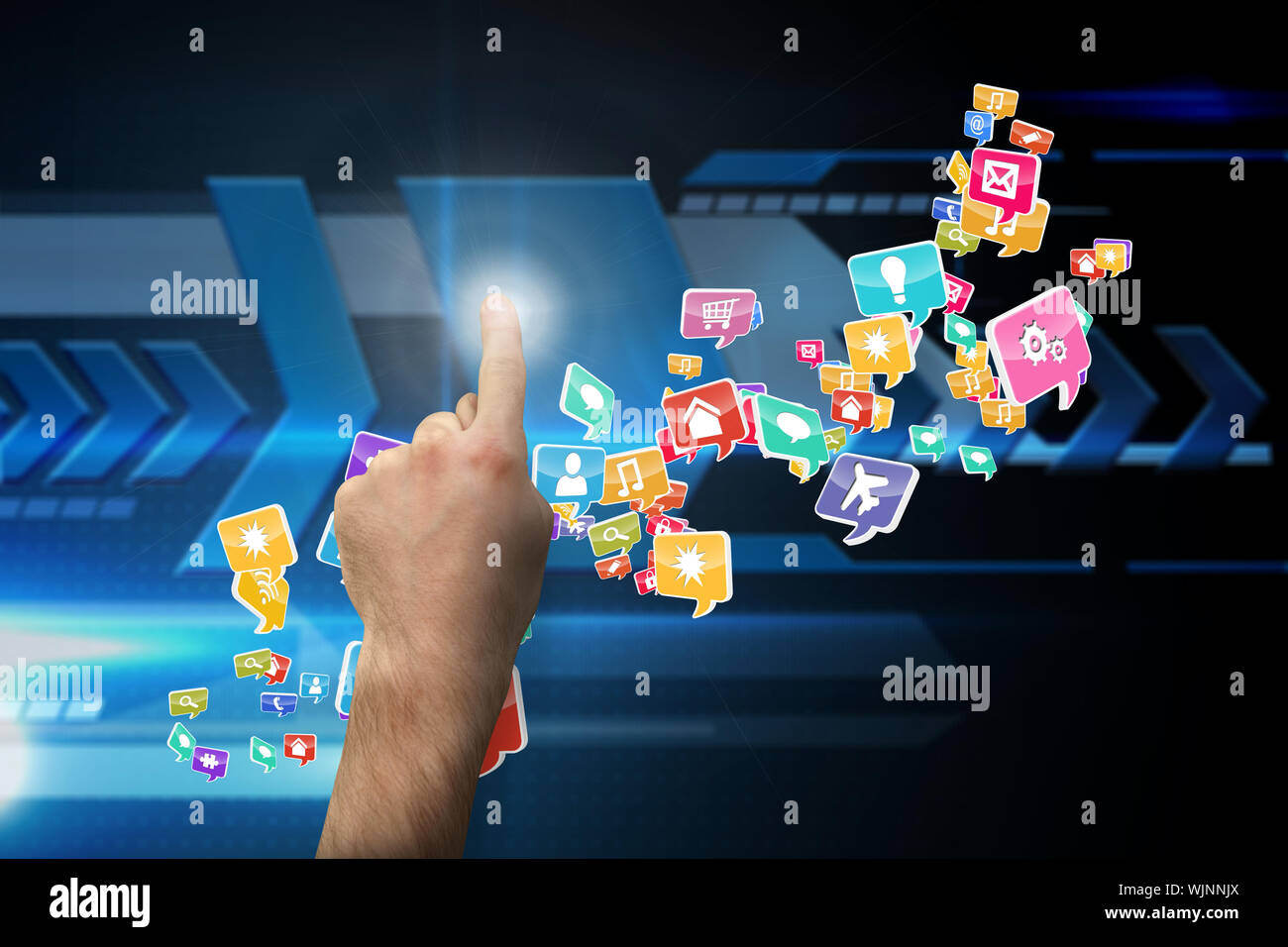 Hand pointing against arrows on technical background Stock Photo - Alamy