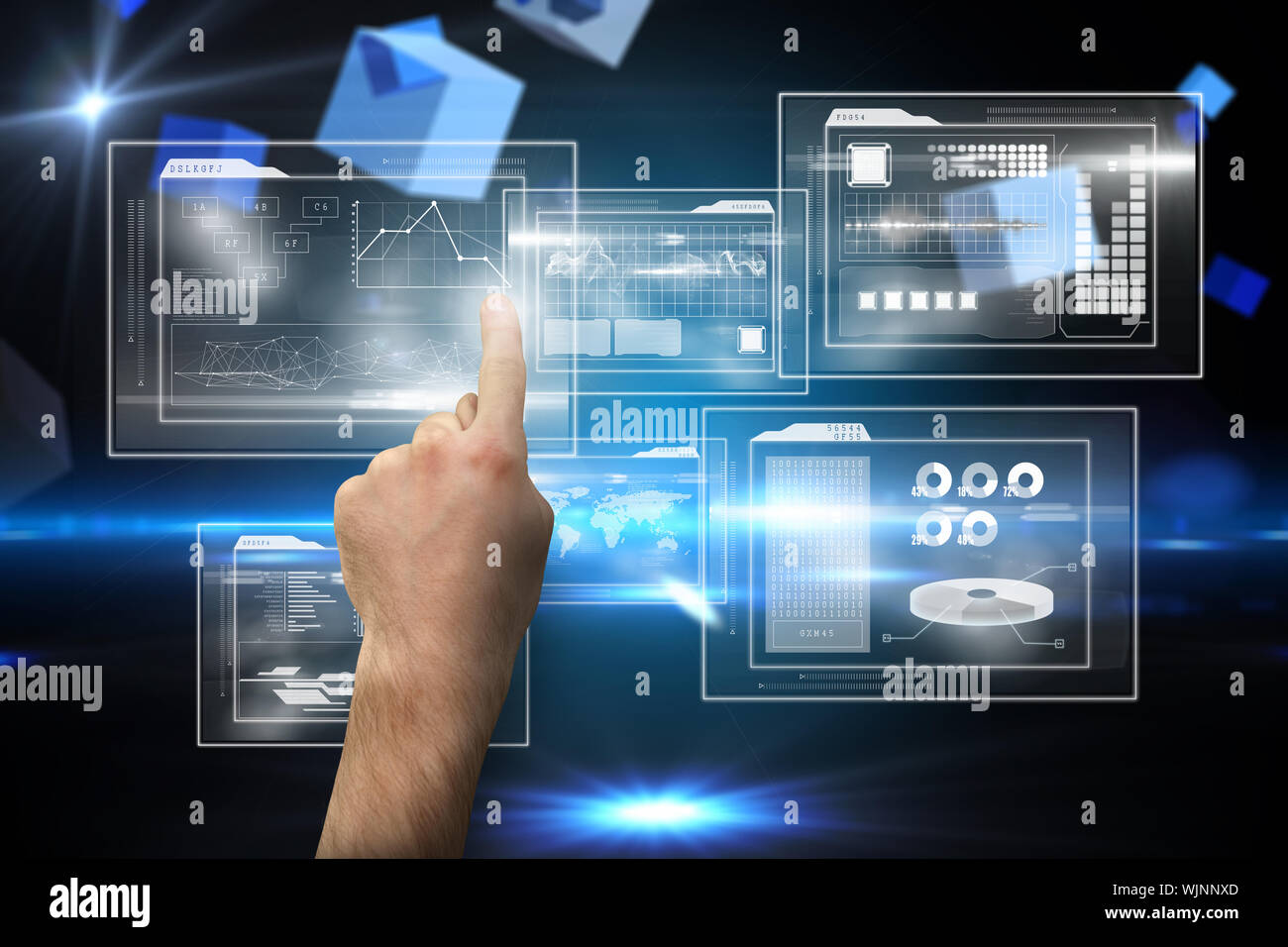 Hand pointing against boxes on technical background Stock Photo - Alamy