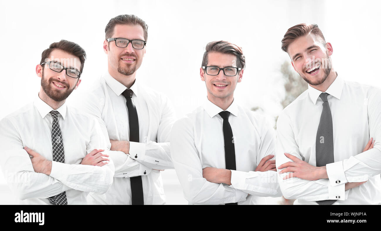 portrait of a successful business team standing near the desktop Stock ...