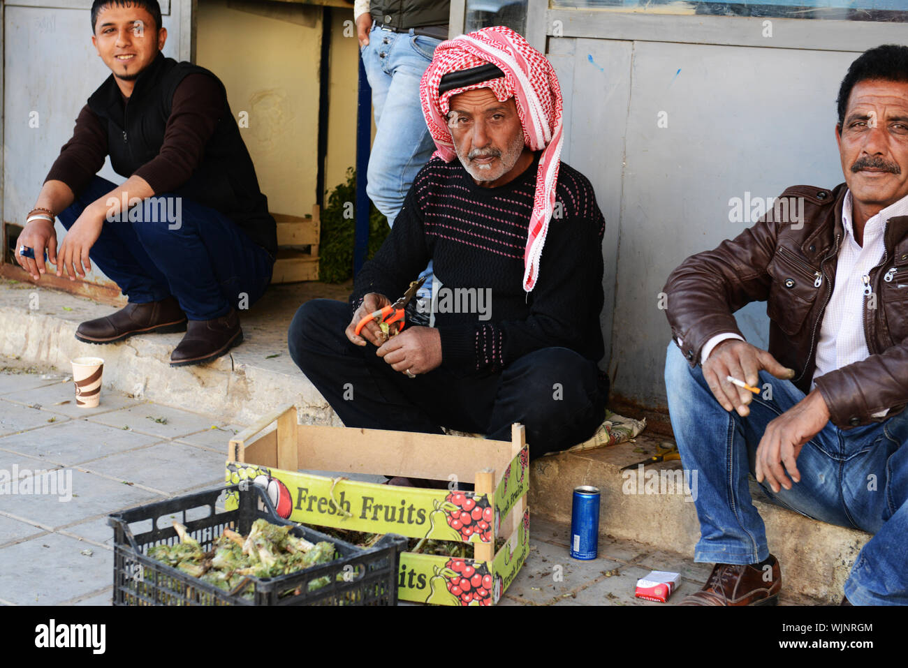 Jordanian men in Madaba, Jordan Stock Photo - Alamy