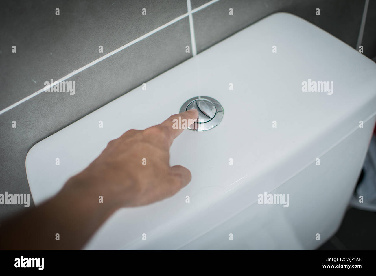 Hand flushing hi-res stock photography and images - Alamy