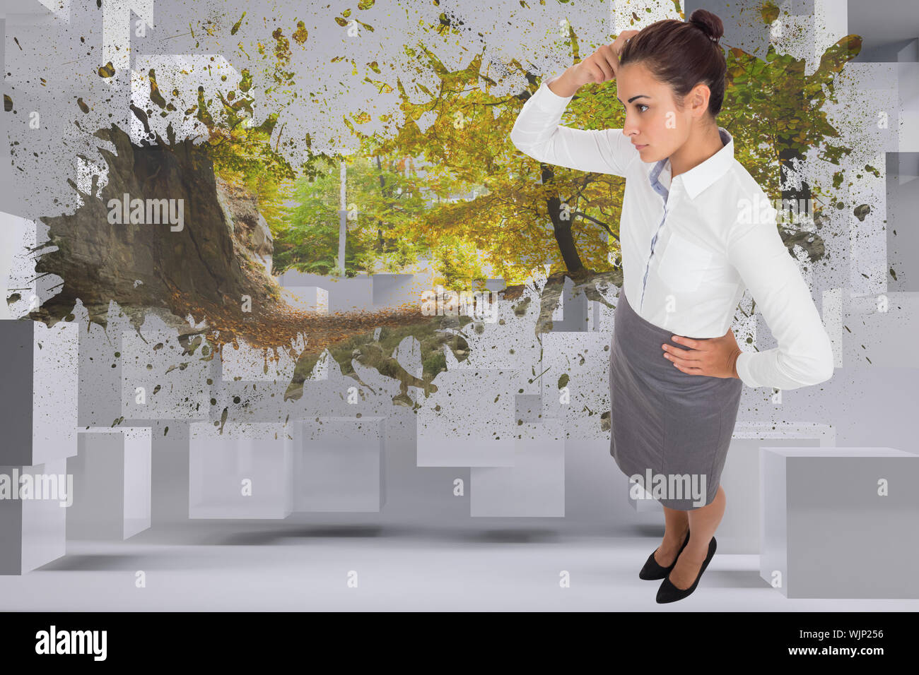 Focused businesswoman against splash showing forest Stock Photo - Alamy