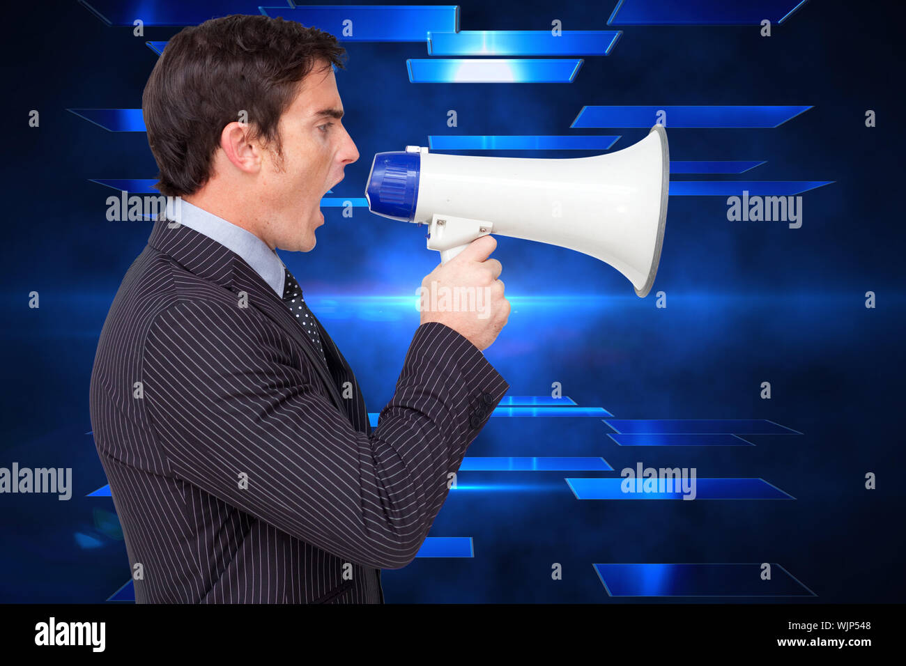 Profile of a businessman shouting through a megaphone against abstract ...
