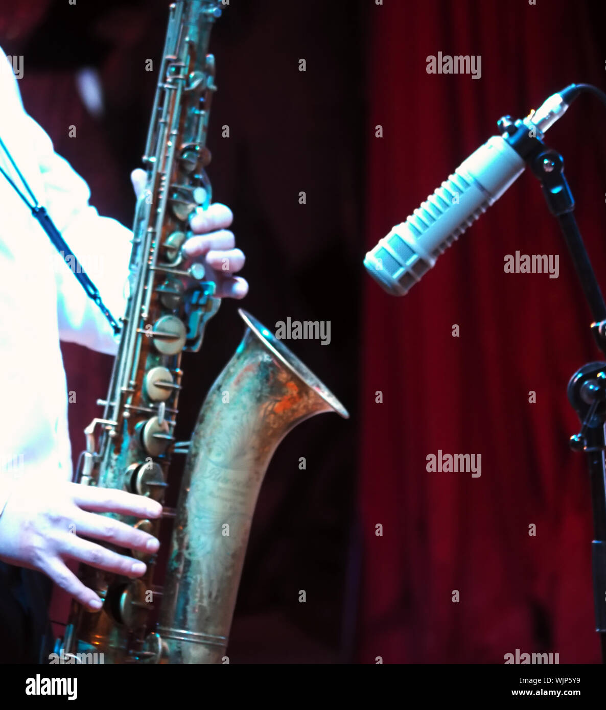 Person playing saxophone hi-res stock photography and images - Alamy