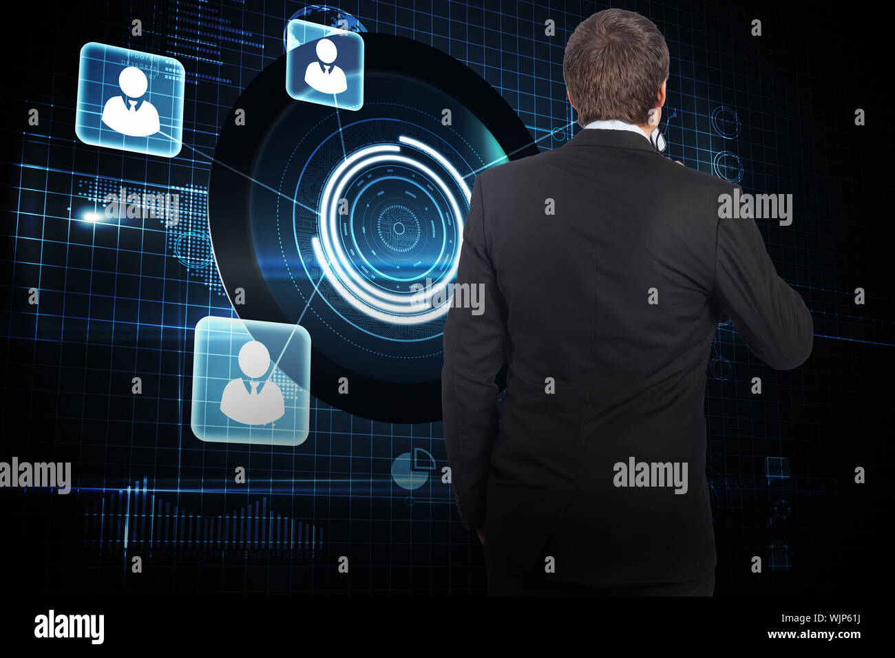 Thinking businessman holding glasses against futuristic technology ...