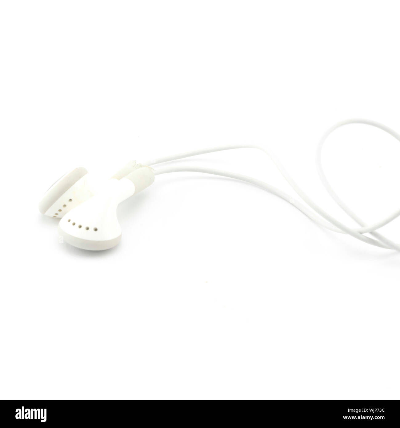 Earphones on ears Cut Out Stock Images & Pictures - Alamy