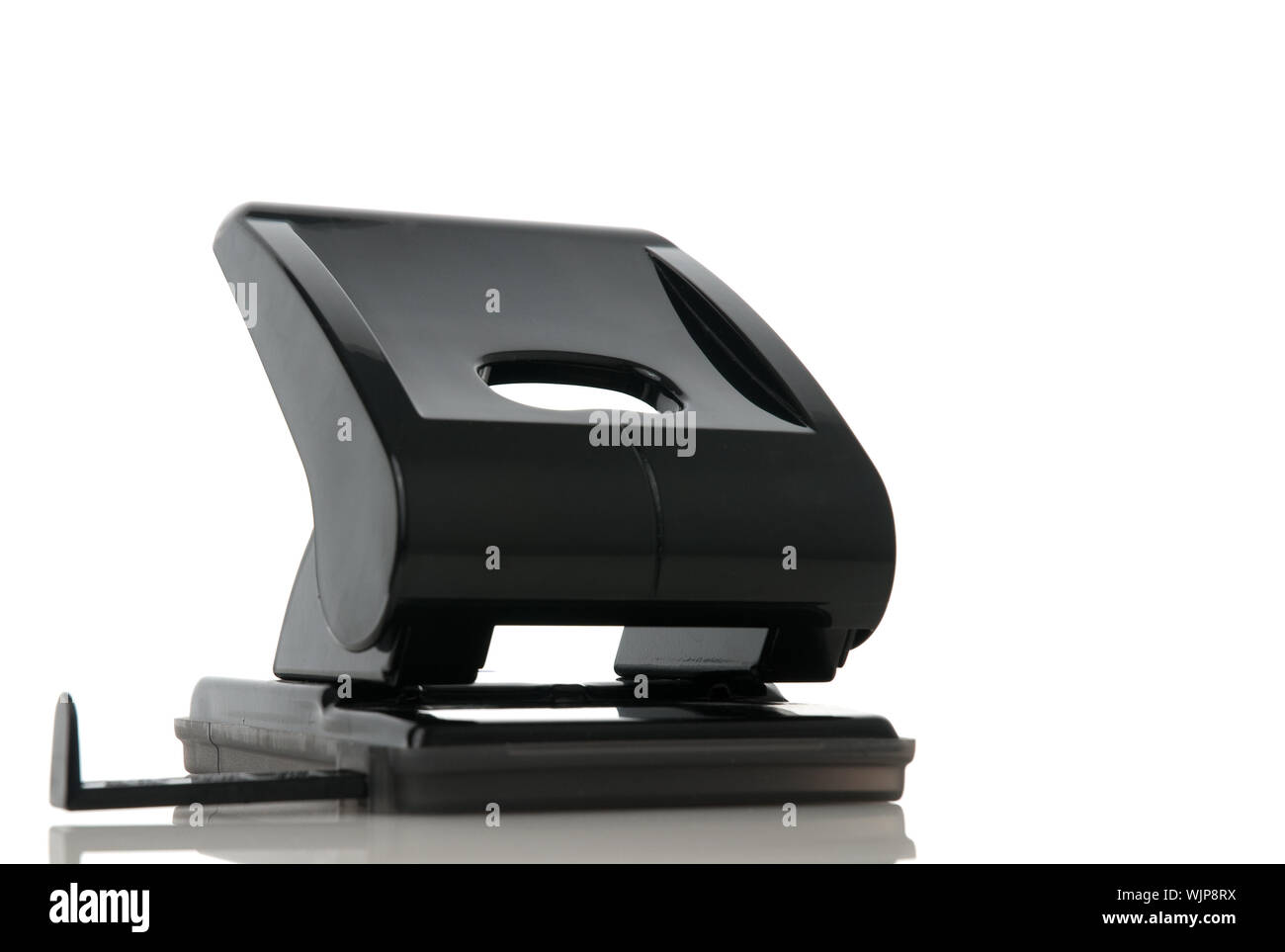 Black hole puncher isolated on white background Stock Photo - Alamy