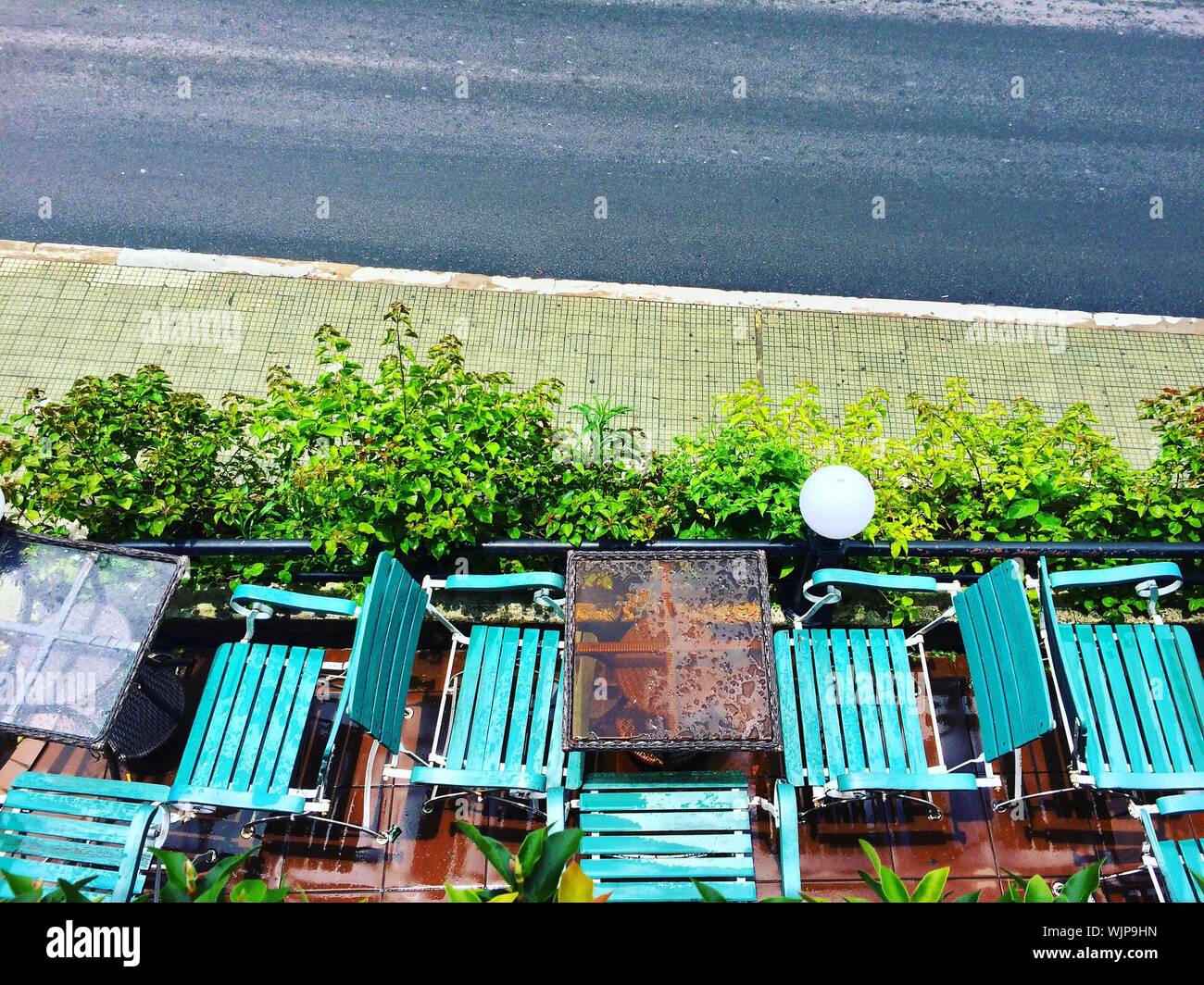 Wet tables and chairs hi-res stock photography and images - Alamy
