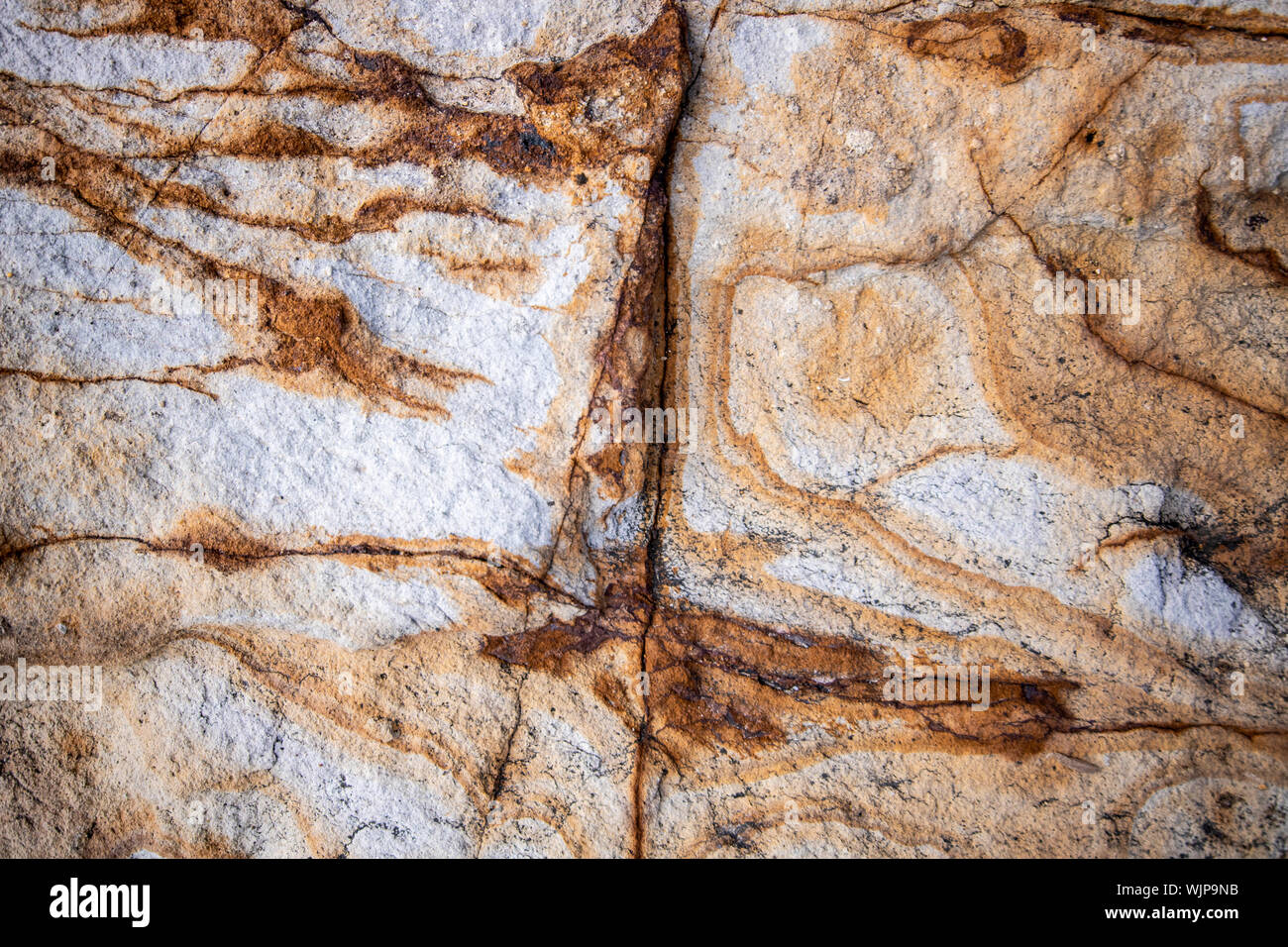 Patterns on the cracked rock Stock Photo - Alamy