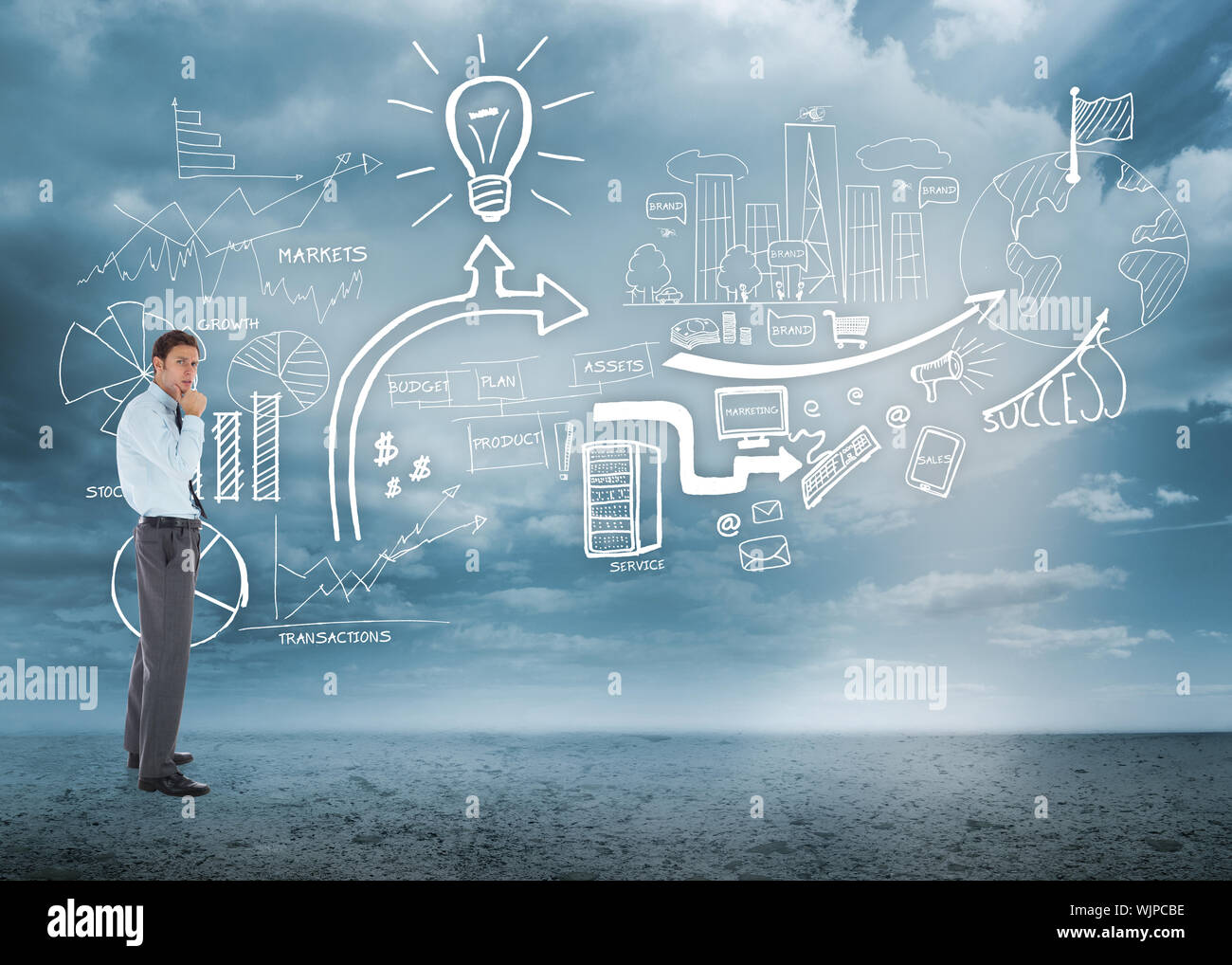 Thoughtful businessman with hand on chin against brainstorm on desert ...