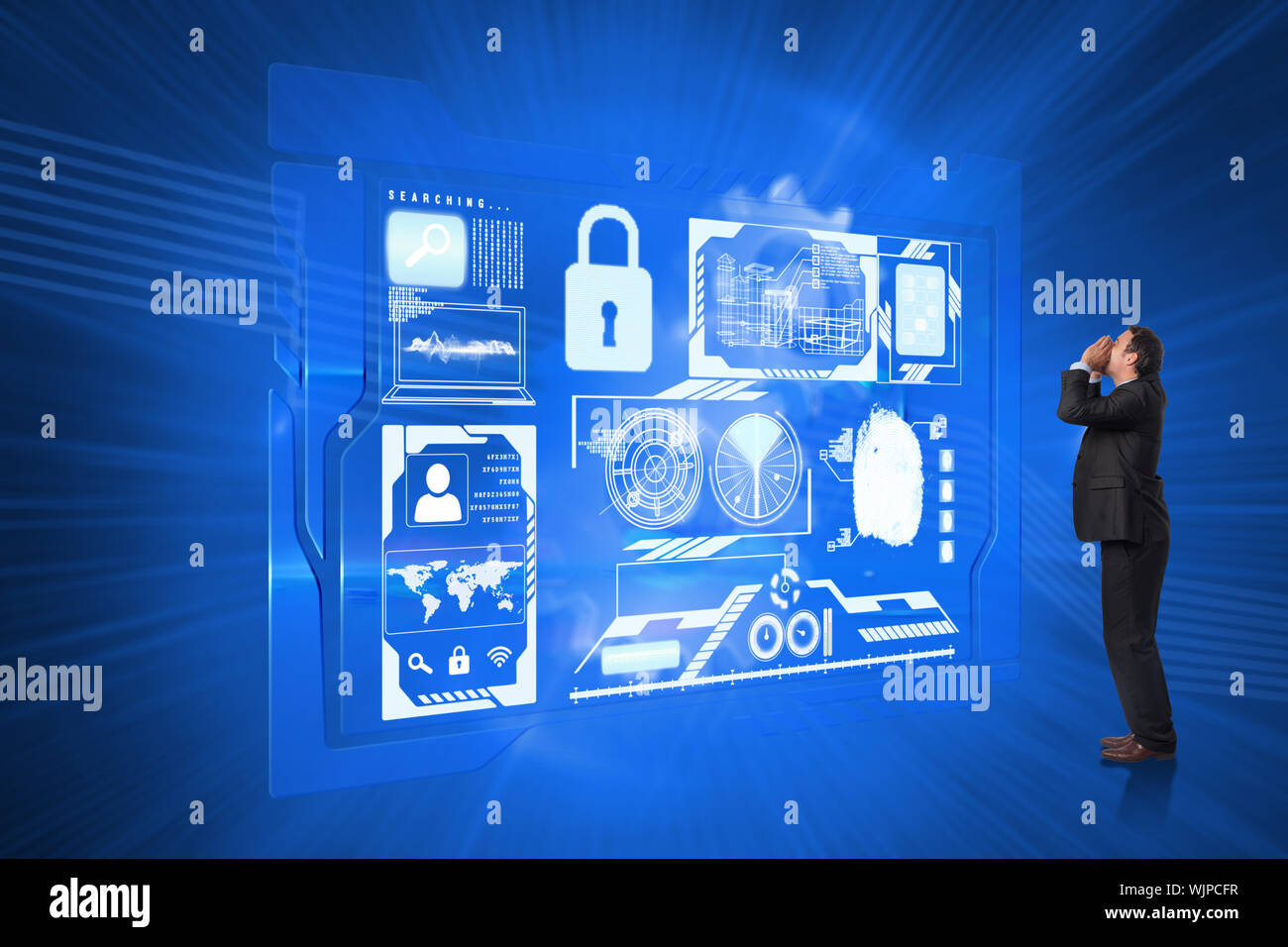 Shouting businessman against shiny cogs on blue background Stock Photo - Alamy